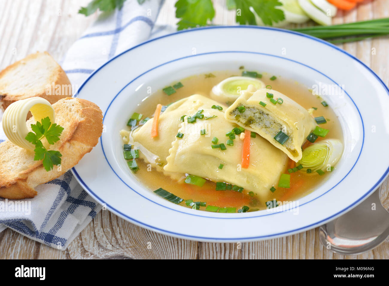 Vegetable broth with Swabian-style stuffed ravioli (so called ...