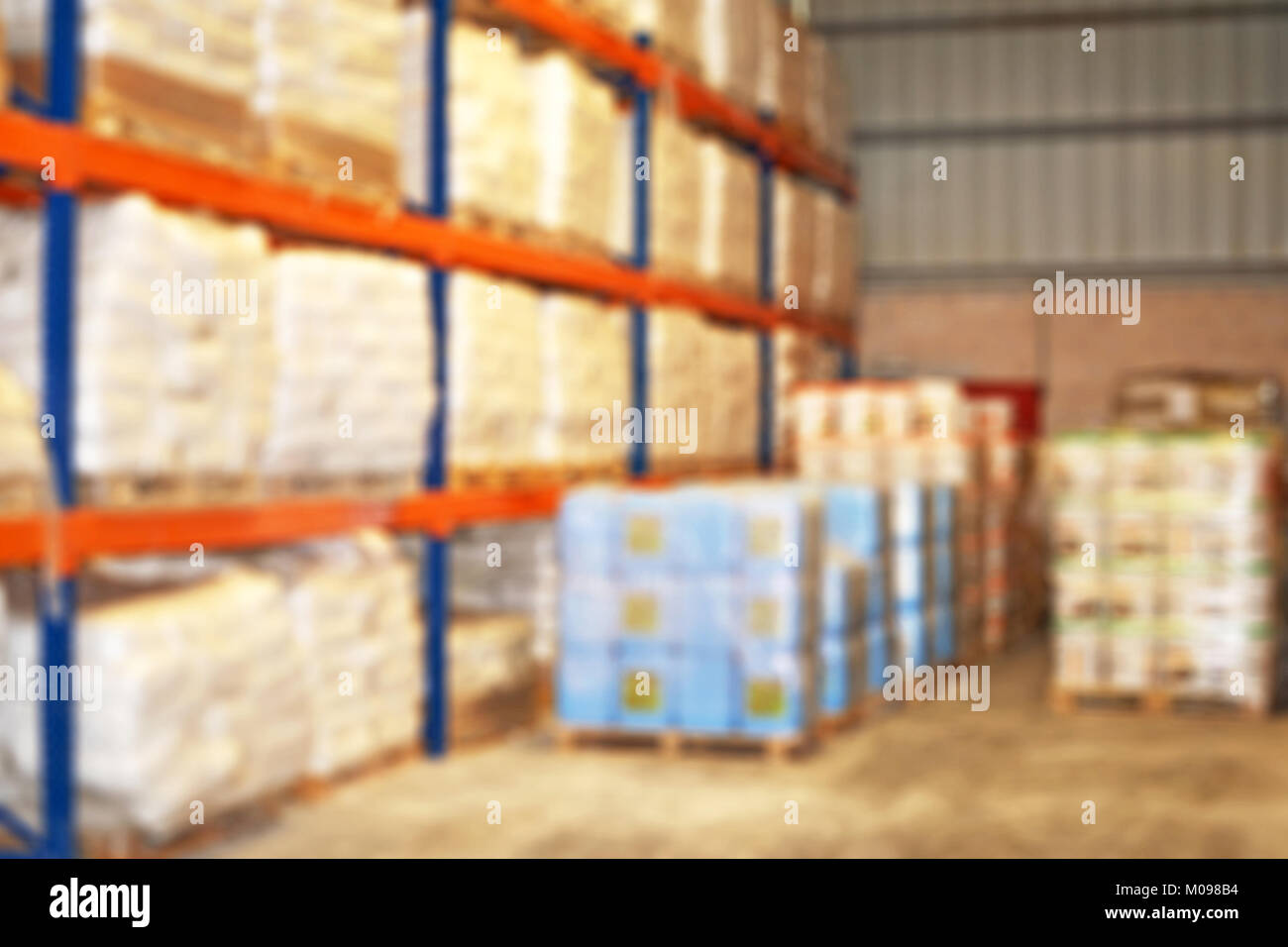 Blurred background of an organized commercial storage area Stock Photo ...
