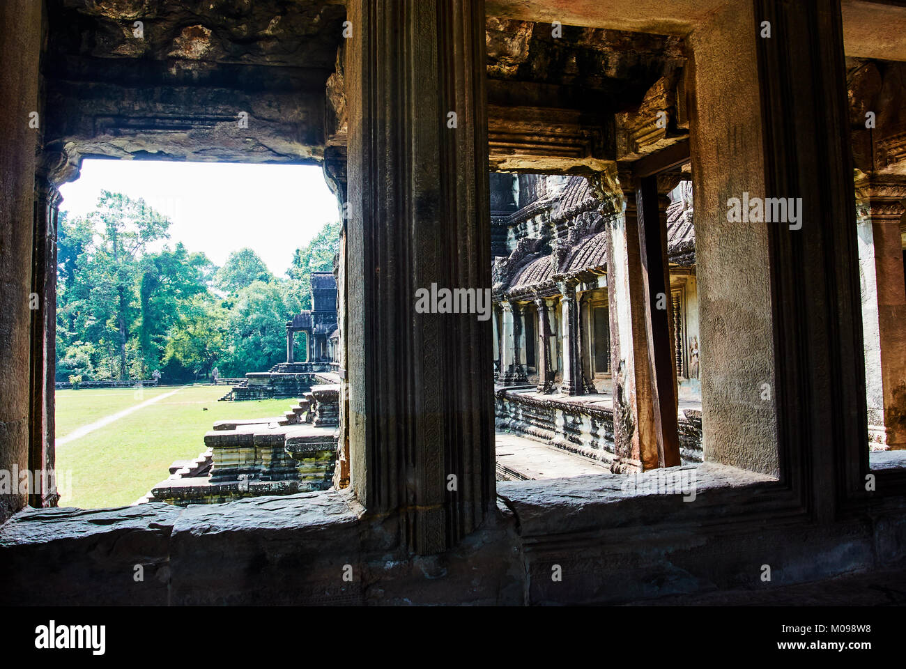 Historic building in Angkor wat Thom Cambodia with devatas carvings ...