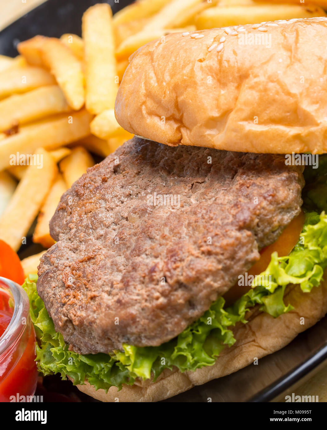 Beef Burger Dinner Representing Junk Food And Cook Stock Photo - Alamy