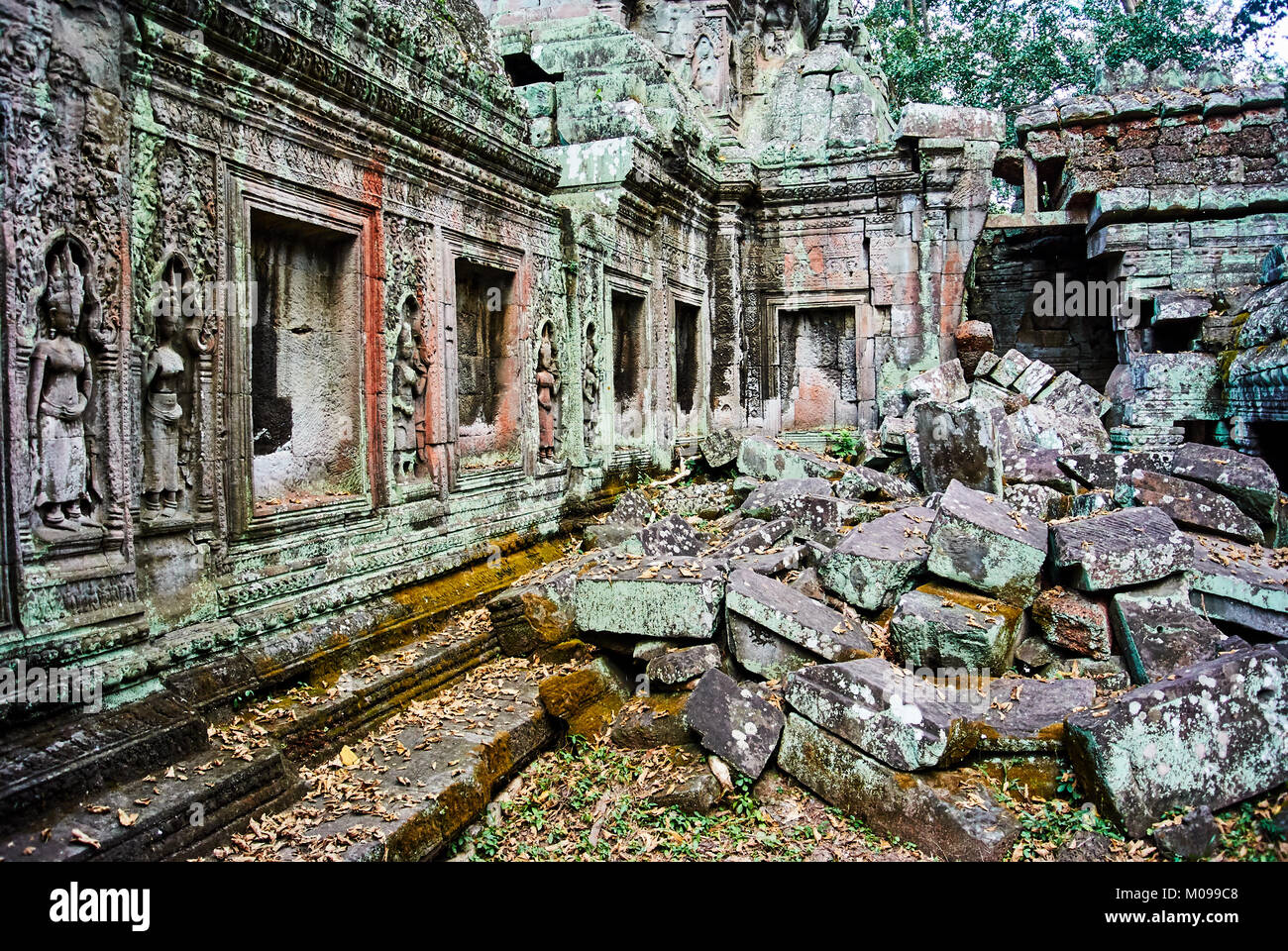 Historic building in Angkor wat Thom Cambodia with devatas carvings ...