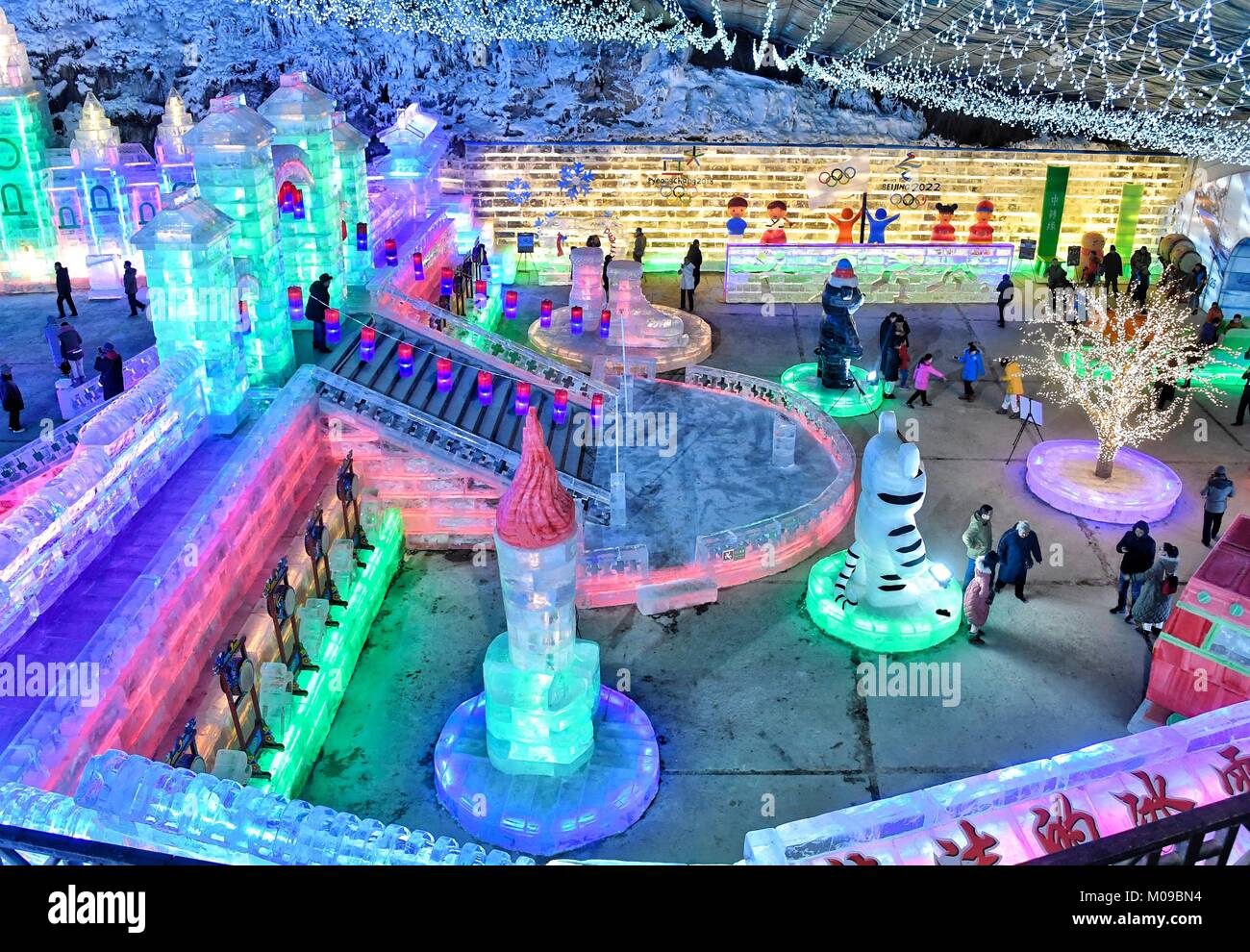 Beijing, China. 19th Jan, 2018. Tourists visit ice lanterns in ...
