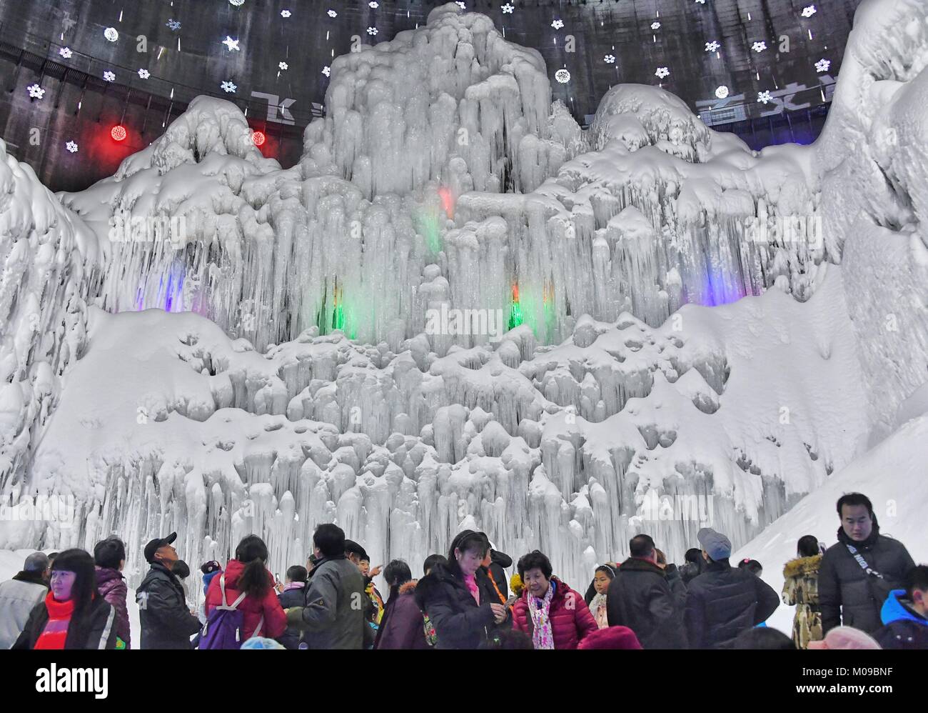 Beijing, China. 19th Jan, 2018. Tourists visit ice waterfall in ...