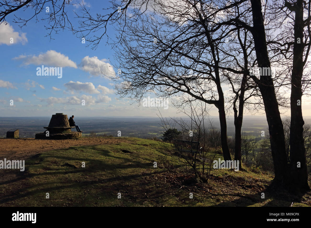 Holmbury Hill, Surrey, UK. 19th Jan, 2018. A man enjoys the sunshine at ...