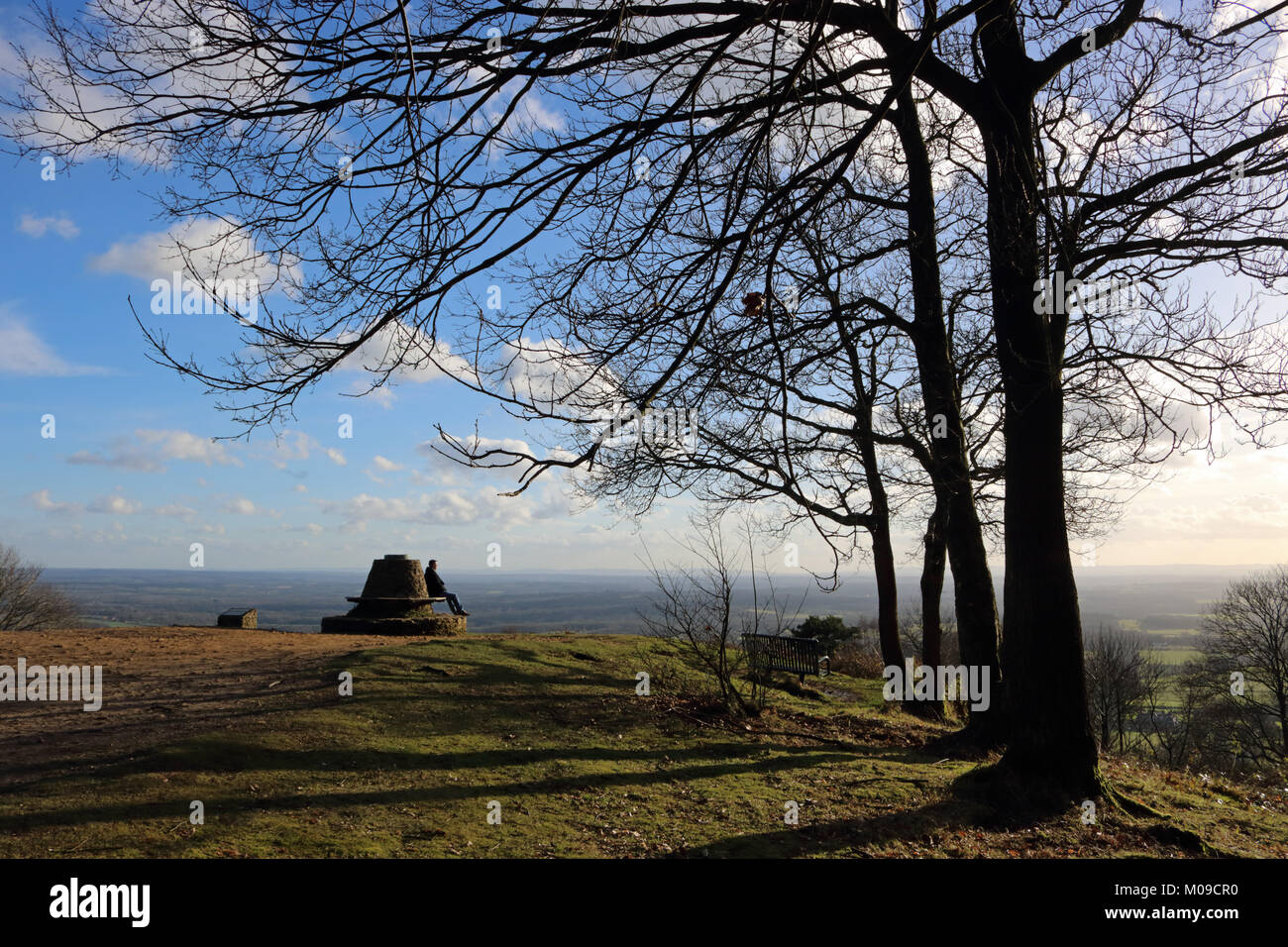 Holmbury Hill, Surrey, UK. 19th Jan, 2018. A man enjoys the sunshine at ...