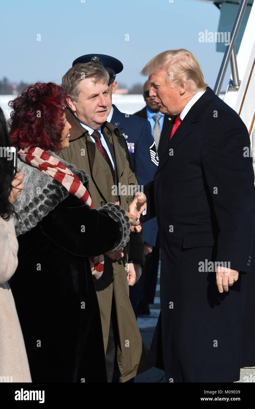 U.S. President Donald Trump is greeted by Rick Saccone, republican ...