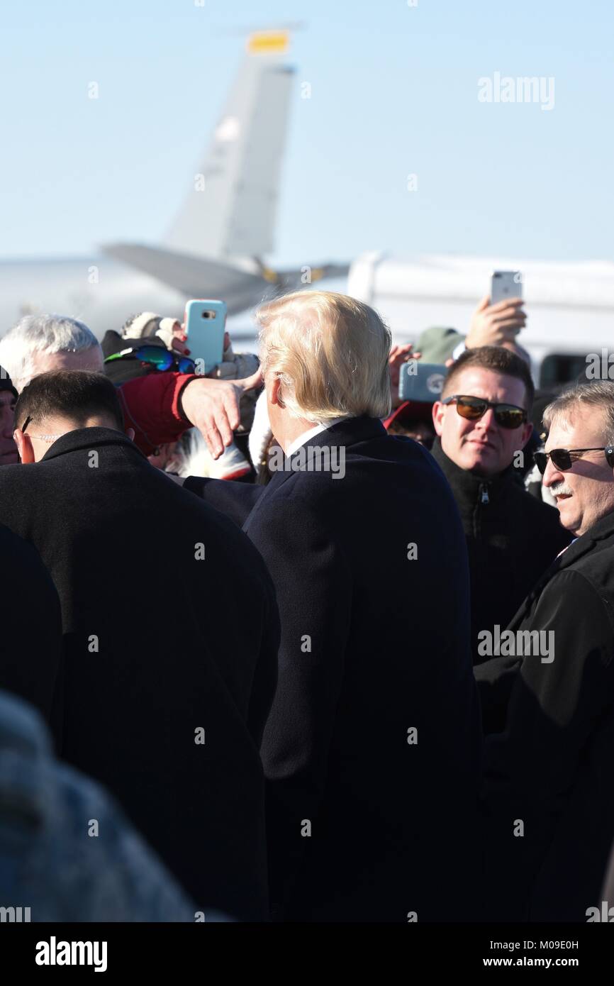 U.S. President Donald Trump greets service members and supporters on ...