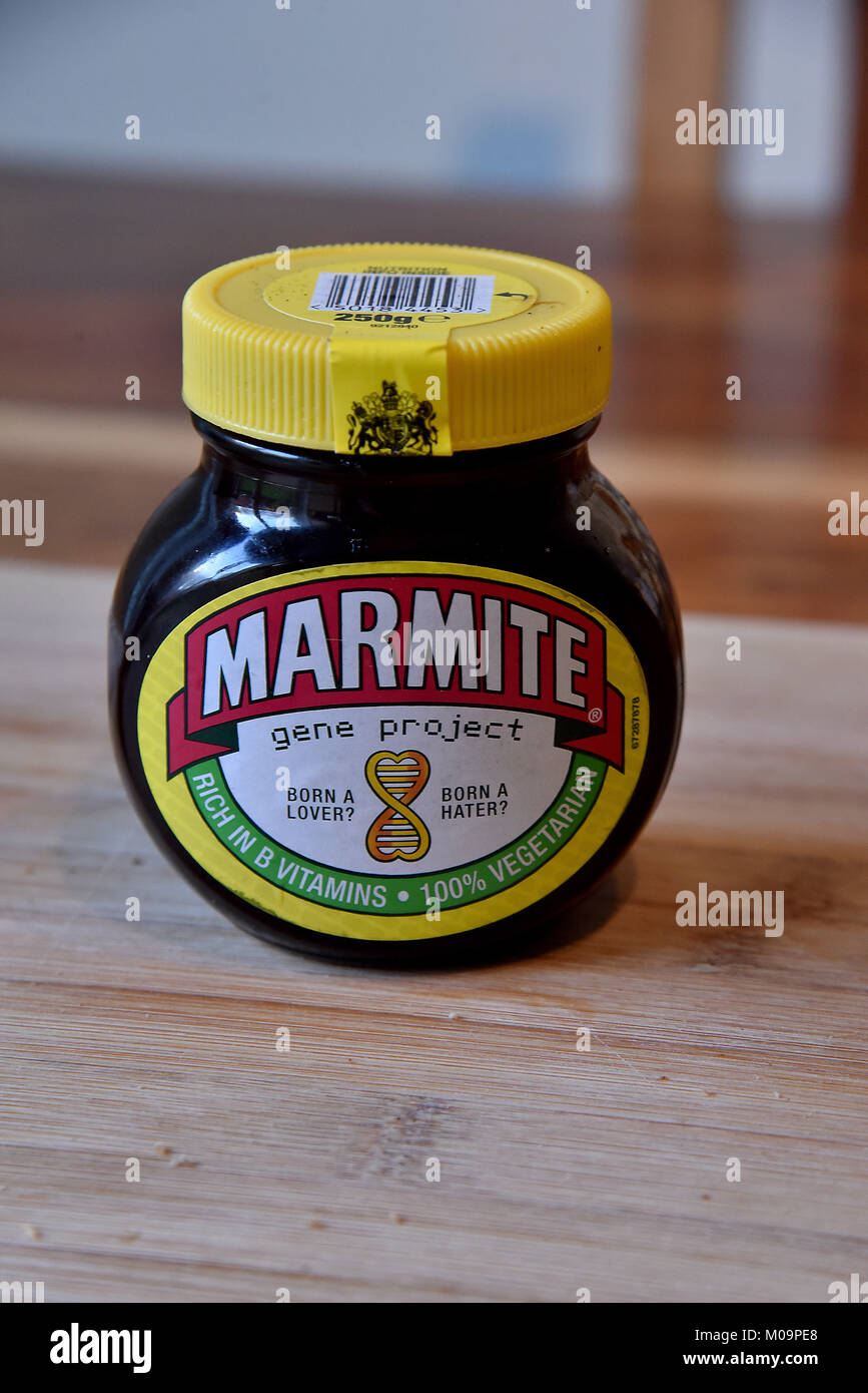 A jar of Marmite with brown bread toast Stock Photo - Alamy