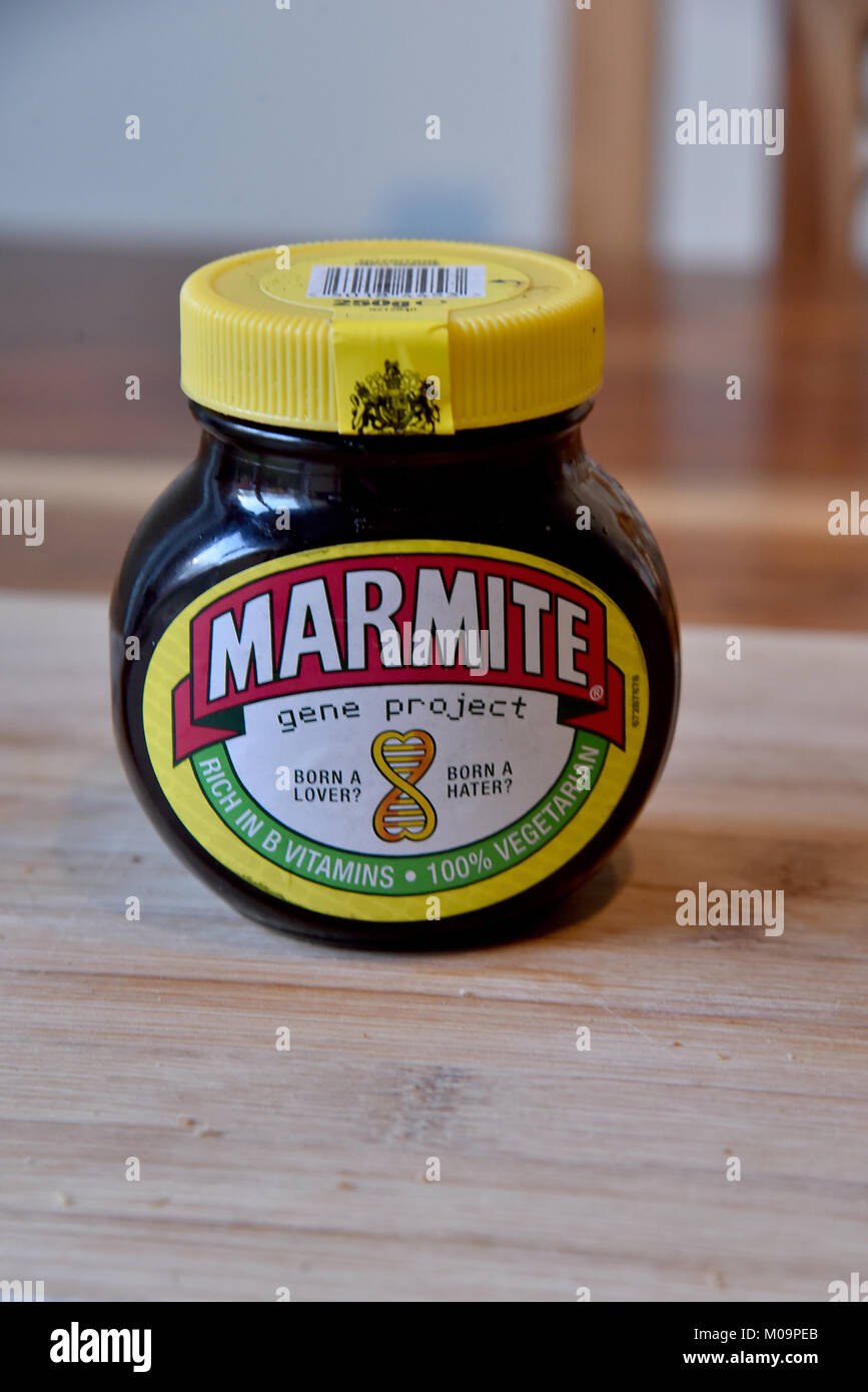 A jar of Marmite with brown bread toast Stock Photo - Alamy
