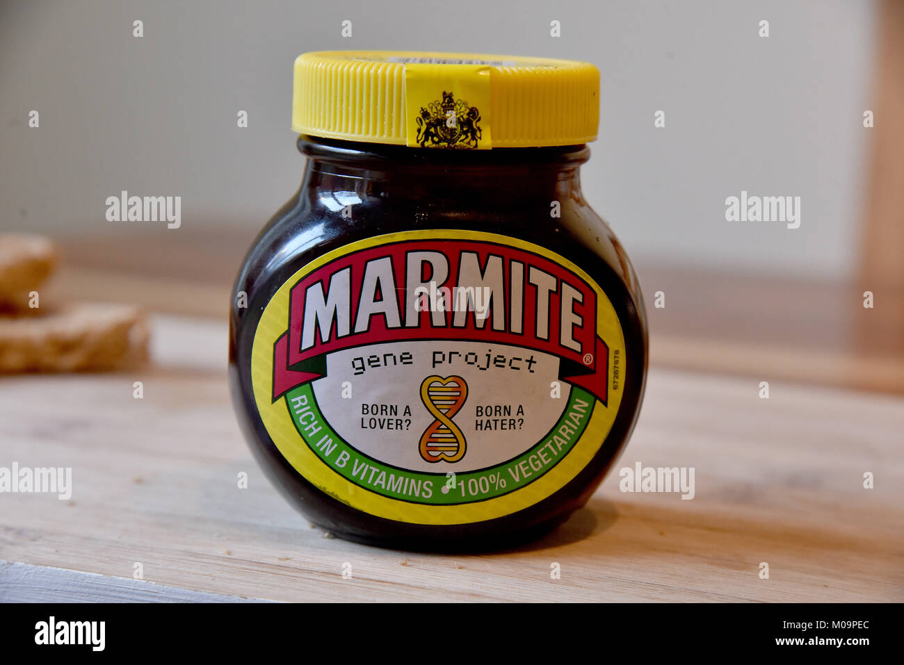 A jar of Marmite with brown bread toast Stock Photo - Alamy