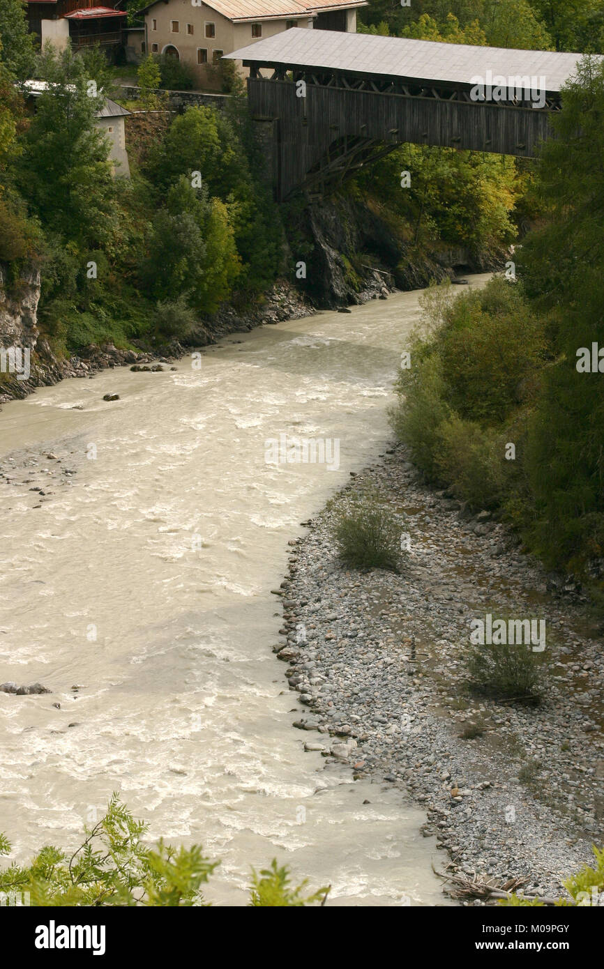 River flowing in the Swiss Alps Stock Photo - Alamy