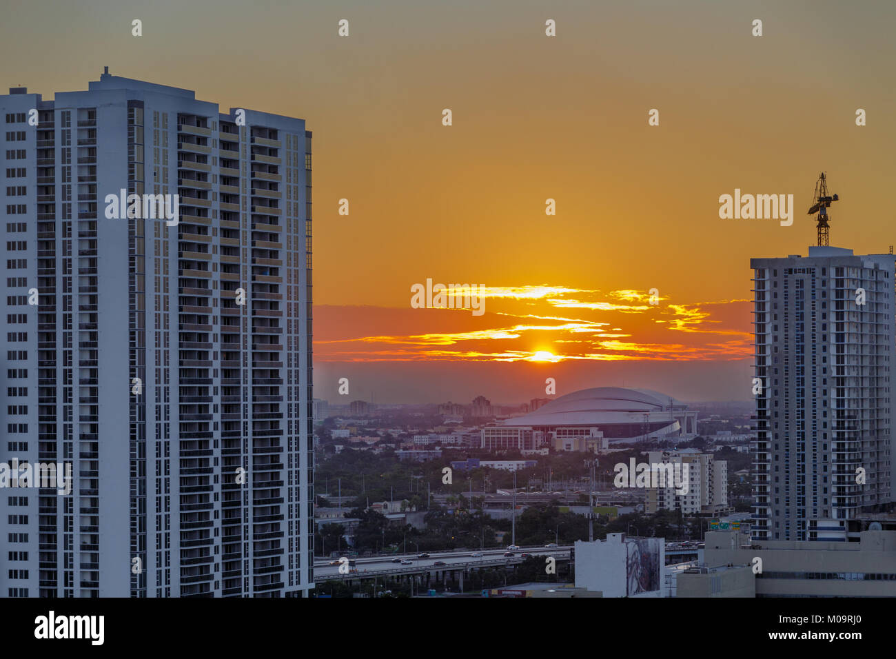 Orange Sunset on Miami Horizon between Hotel Towers Stock Photo - Alamy