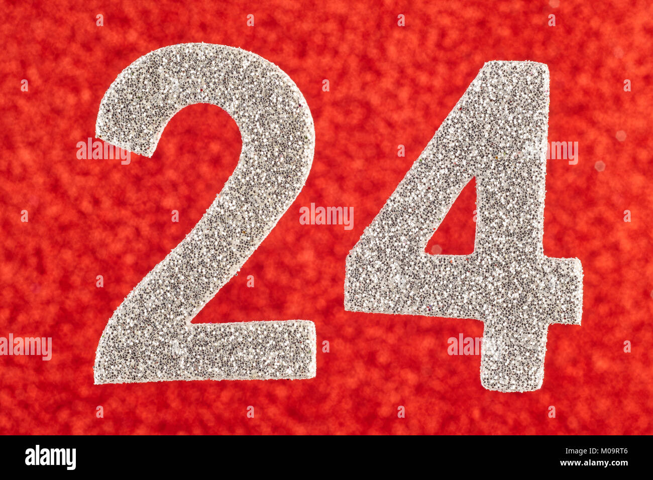 Number twenty-four silver color over a red background. Anniversary ...