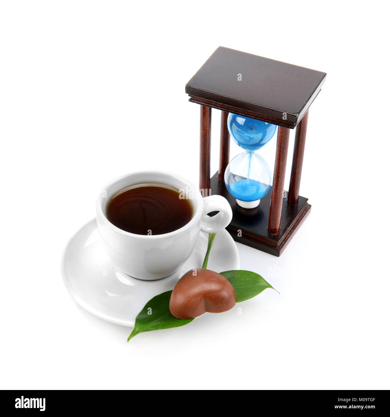 hourglass and a cup of coffee isolated on white background Stock Photo ...