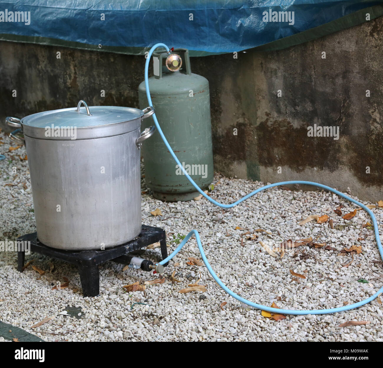aluminum pot with the gas cylinder in the camp kitchen Stock Photo - Alamy
