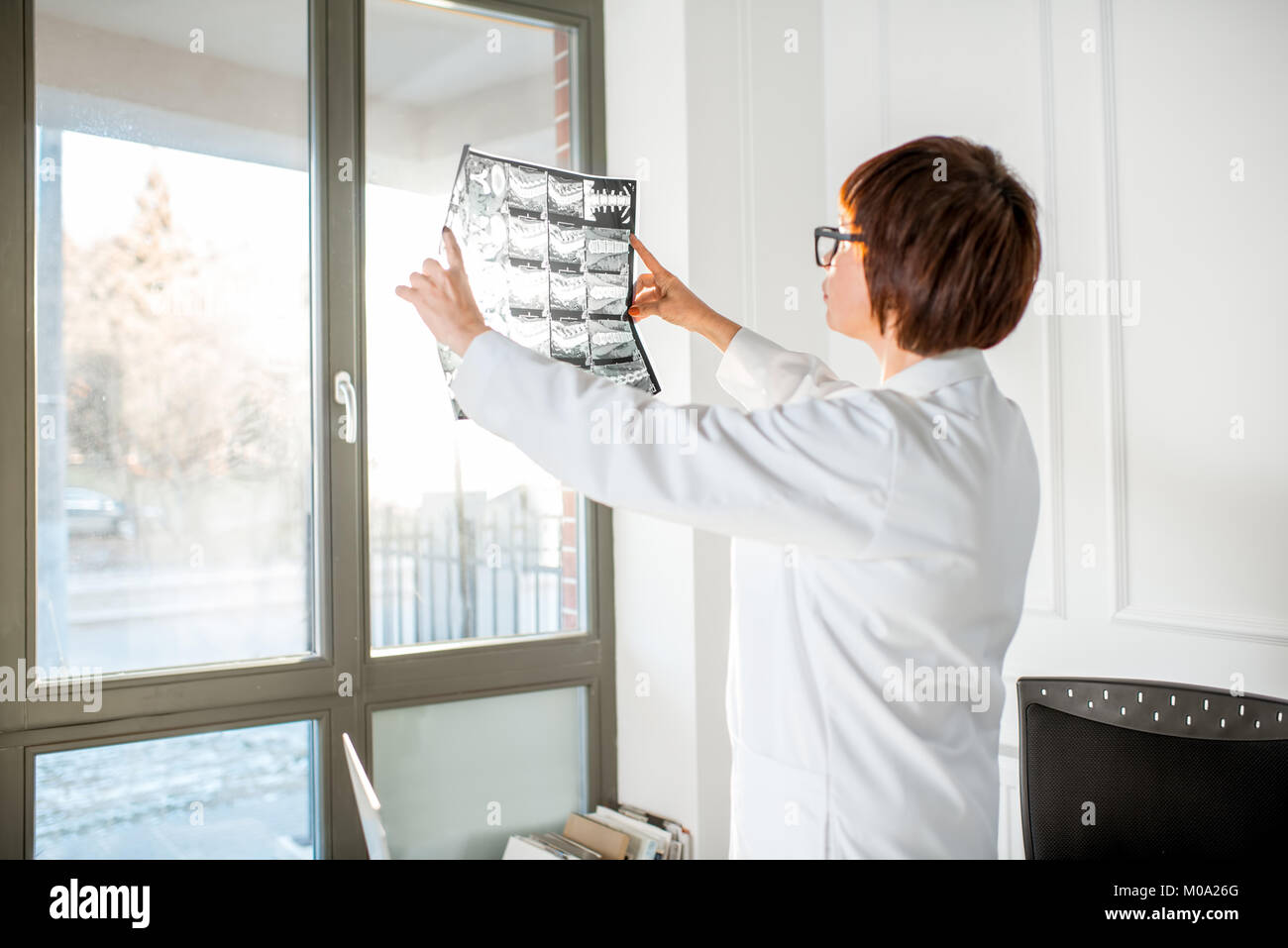 Doctor examining ray in office hi-res stock photography and images - Alamy
