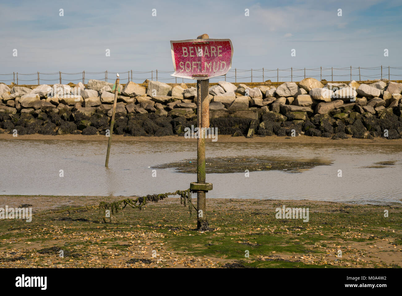 Sign: Beware soft mud, seen in Herne Bay, Kent, England, UK - with ...