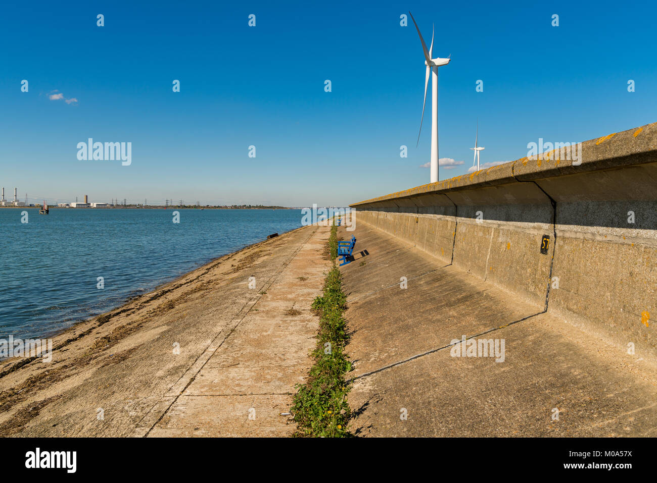 A bench and wind turbines in Queenborough, Isle of Sheppey, Kent ...