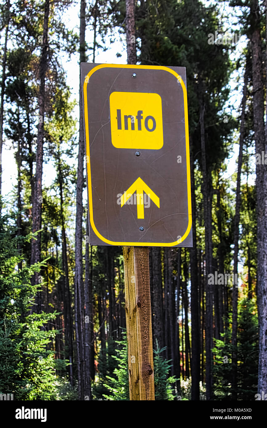 An Information Ahead sign at a park Stock Photo - Alamy