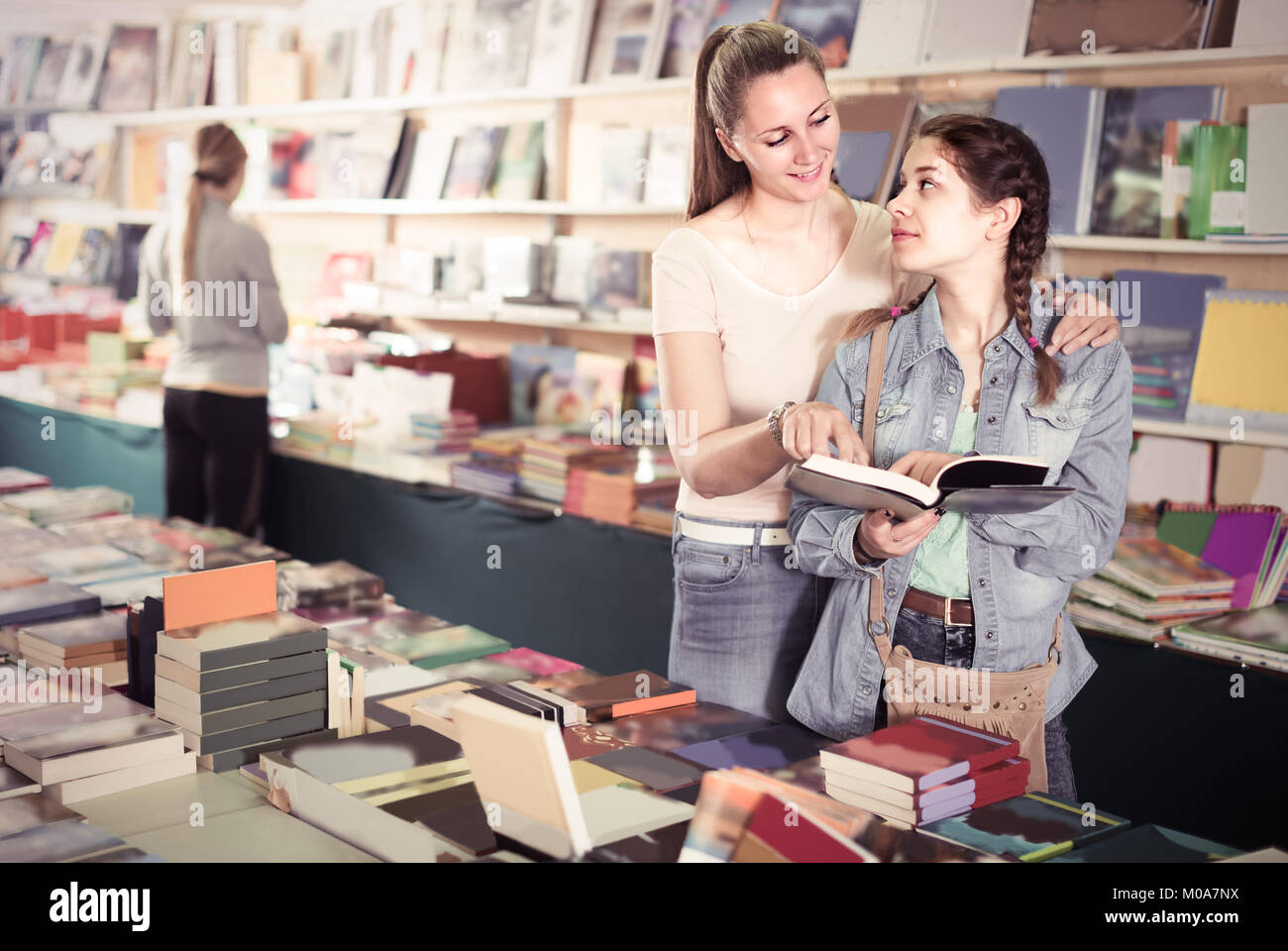 Customers are choosing books in bookstore Stock Photo - Alamy