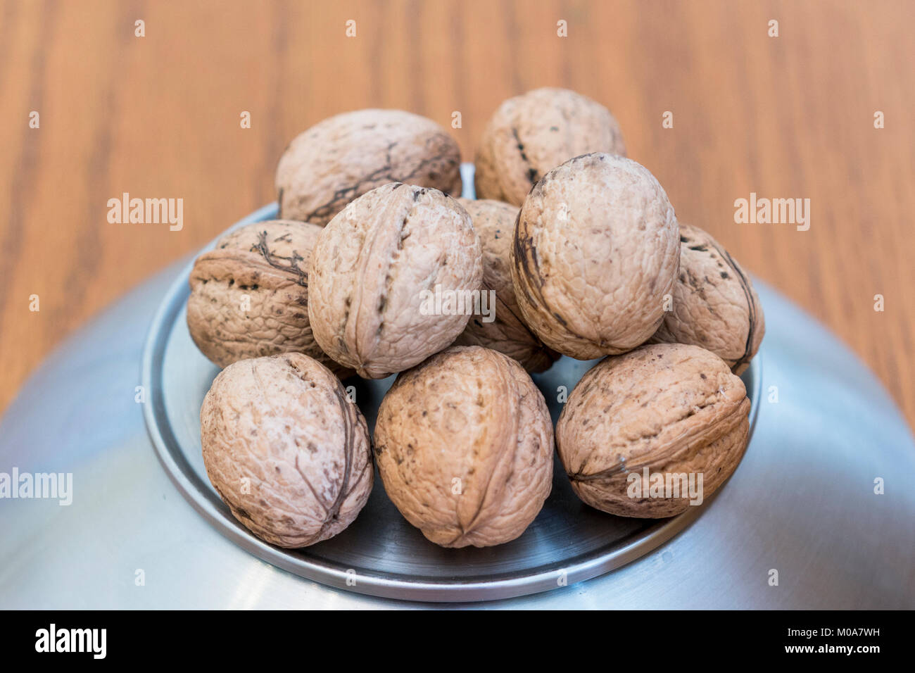 A handful of walnuts Stock Photo - Alamy