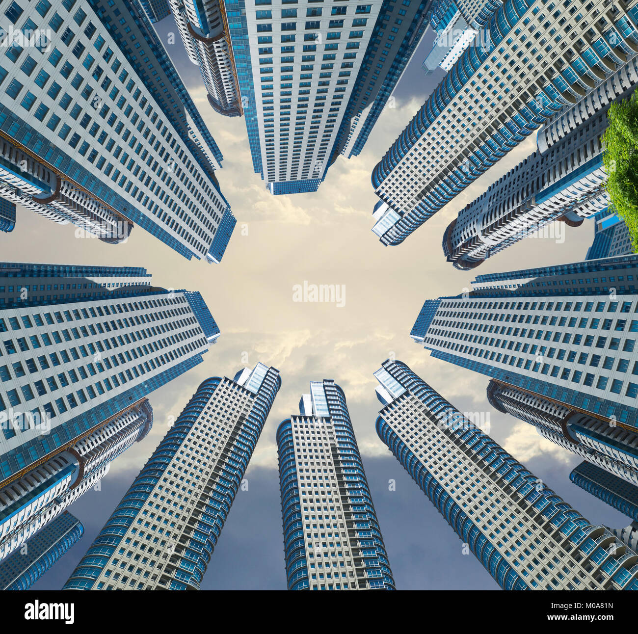 Circle of towering buildings situated on the background of sky Stock ...