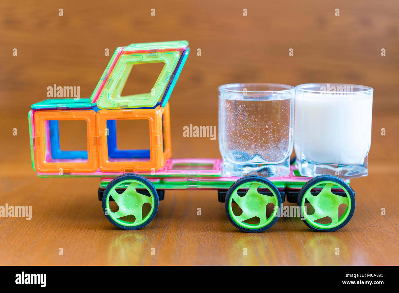 the car carries water and milk Stock Photo - Alamy