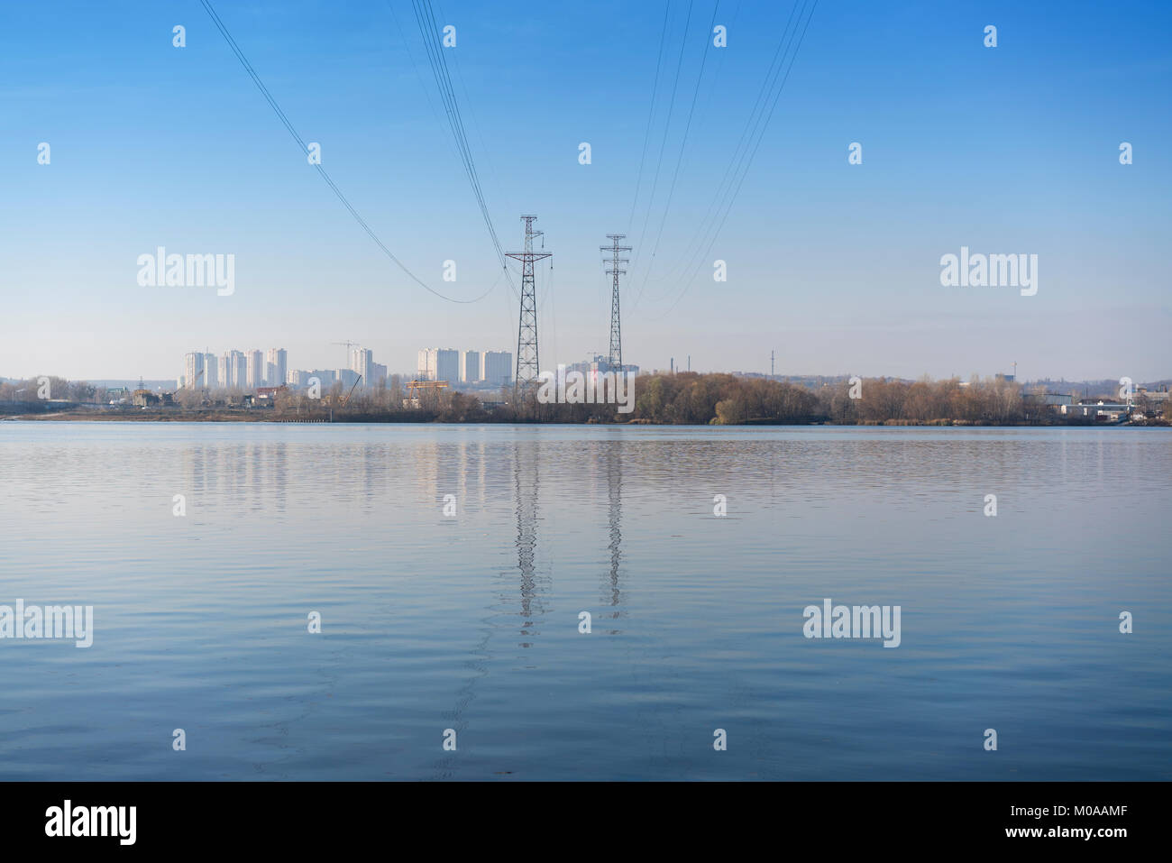High-voltage wires are laid over the river Stock Photo - Alamy