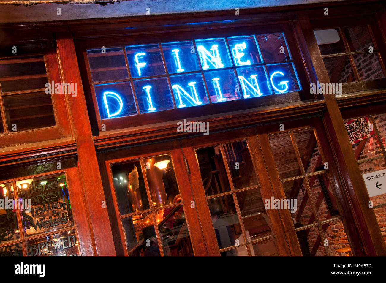 Neon fine dining sign Stock Photo - Alamy