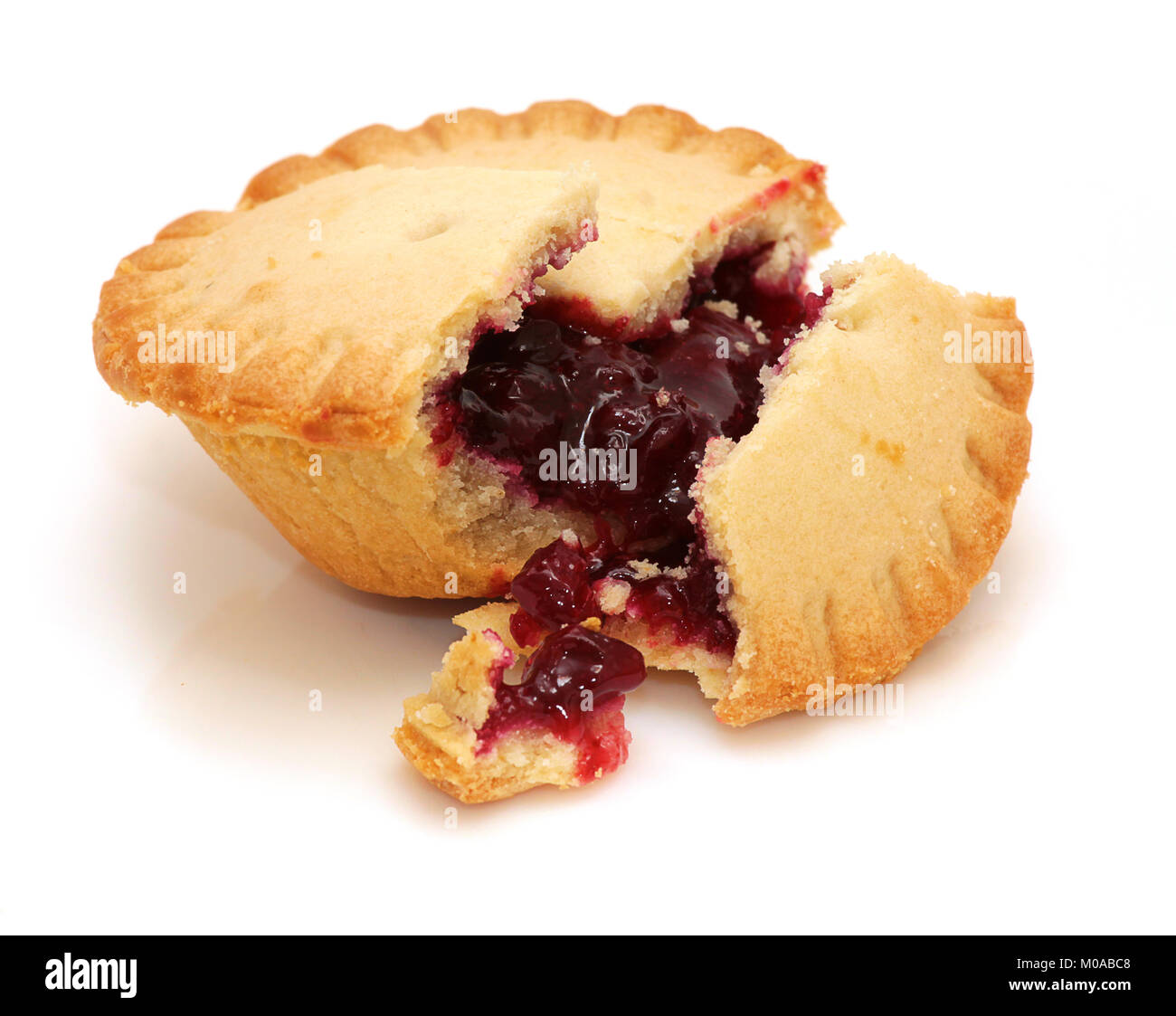 Full tray of delicious fresh berry cakes garnished Stock Photo - Alamy