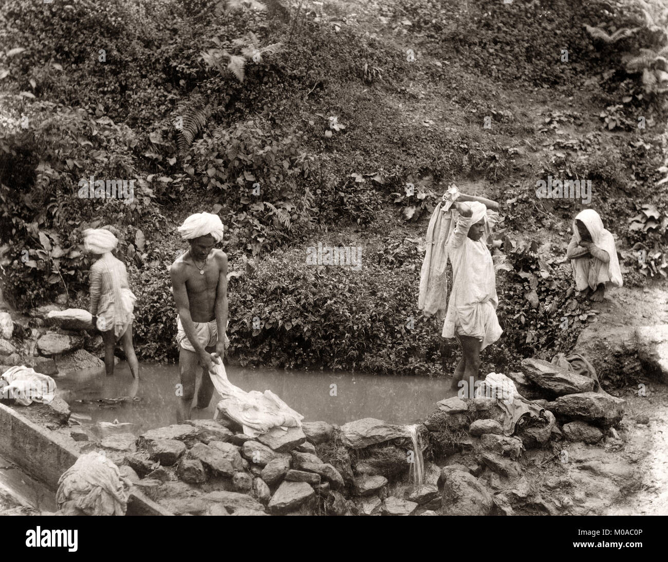 Washing clothes in a river, India, c.1880's Stock Photo - Alamy