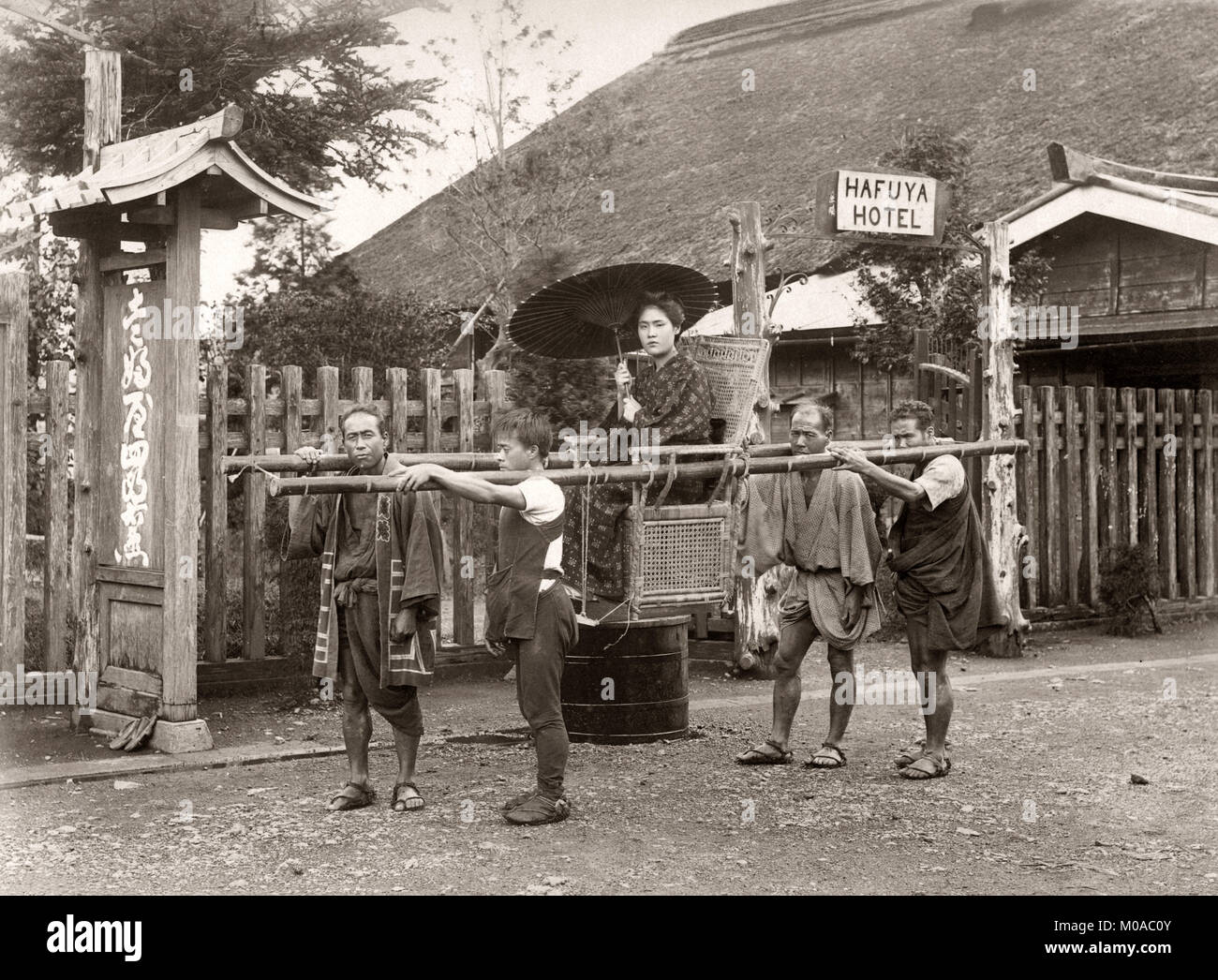 Woman in sedan chair and bearers, Hafuya Hotel, Japan, c.1880's Stock ...