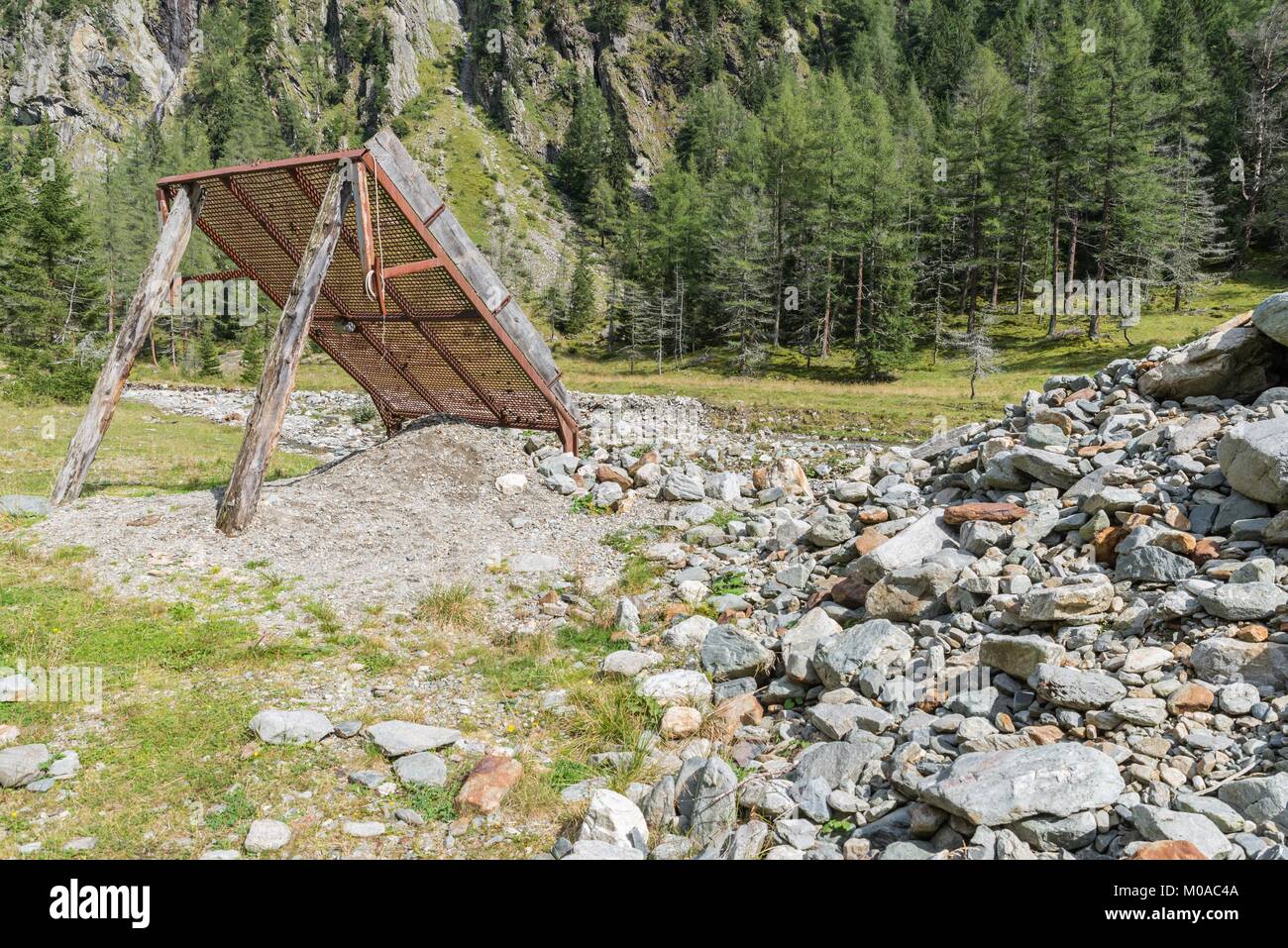 Giant stone sieve in the Mountains, Austria Stock Photo - Alamy