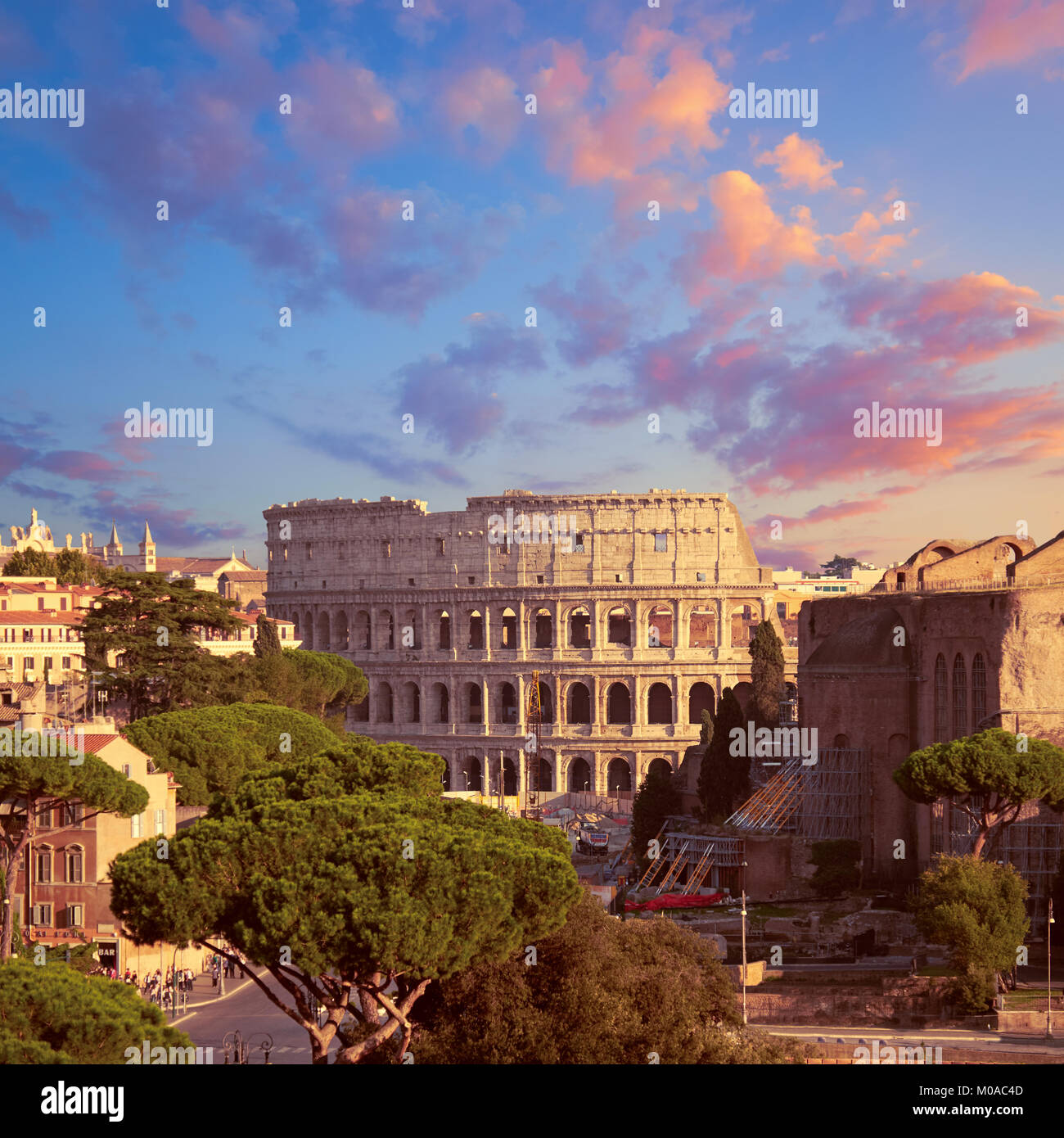 Construction work by Colosseum in Rome, Italy, on a sunset, panoramic ...