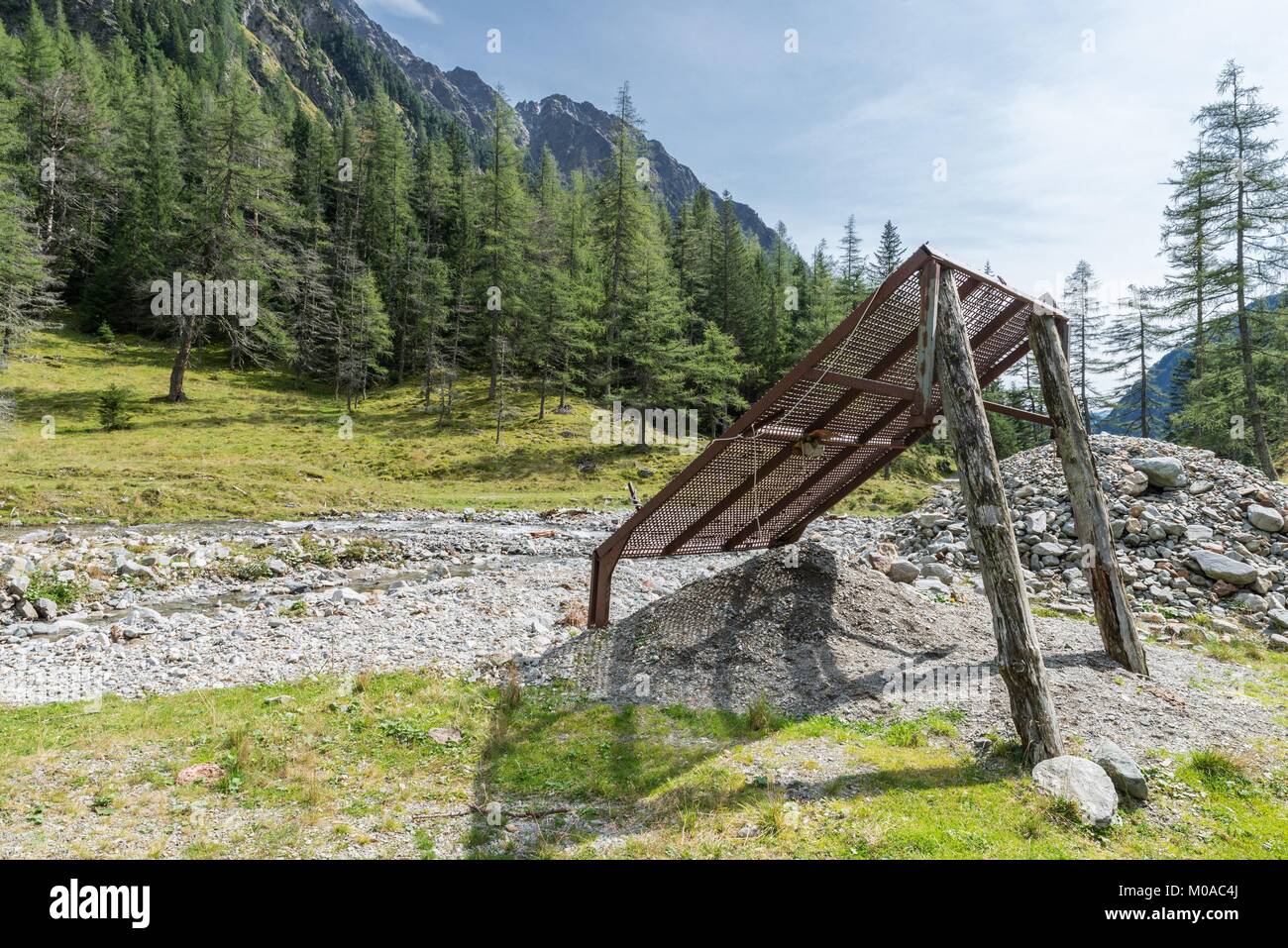 Giant stone sieve in the Mountains, Austria Stock Photo - Alamy