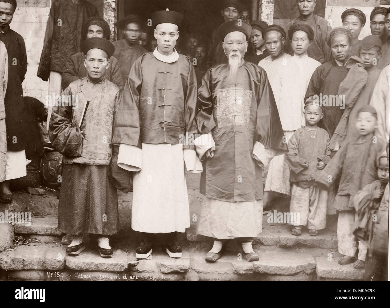 Group of Chinese men and children, c.1900 Stock Photo - Alamy