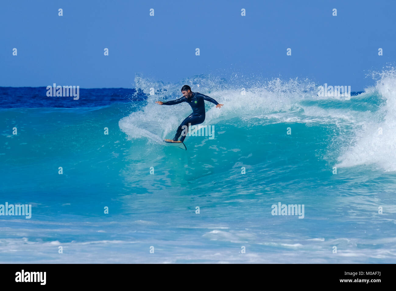 Handsome surfers is hi-res stock photography and images - Alamy