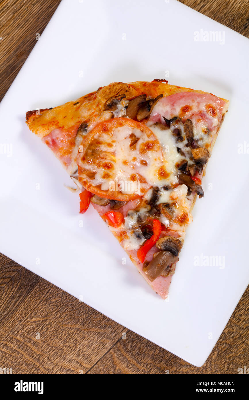 Pizza with ham and cheese Stock Photo - Alamy