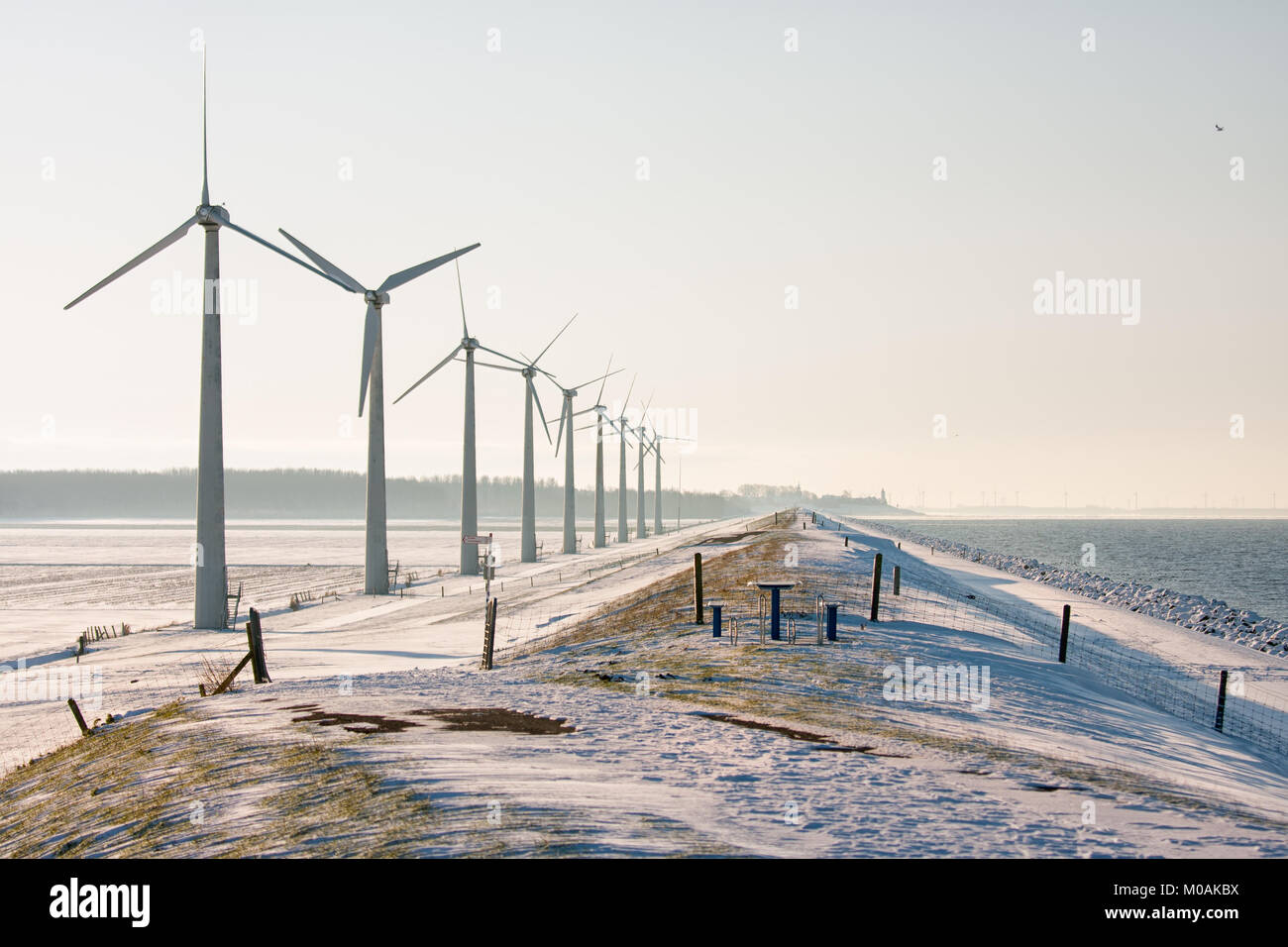 Dutch winter landscape with snow , windturbines and skyline Urk Stock ...