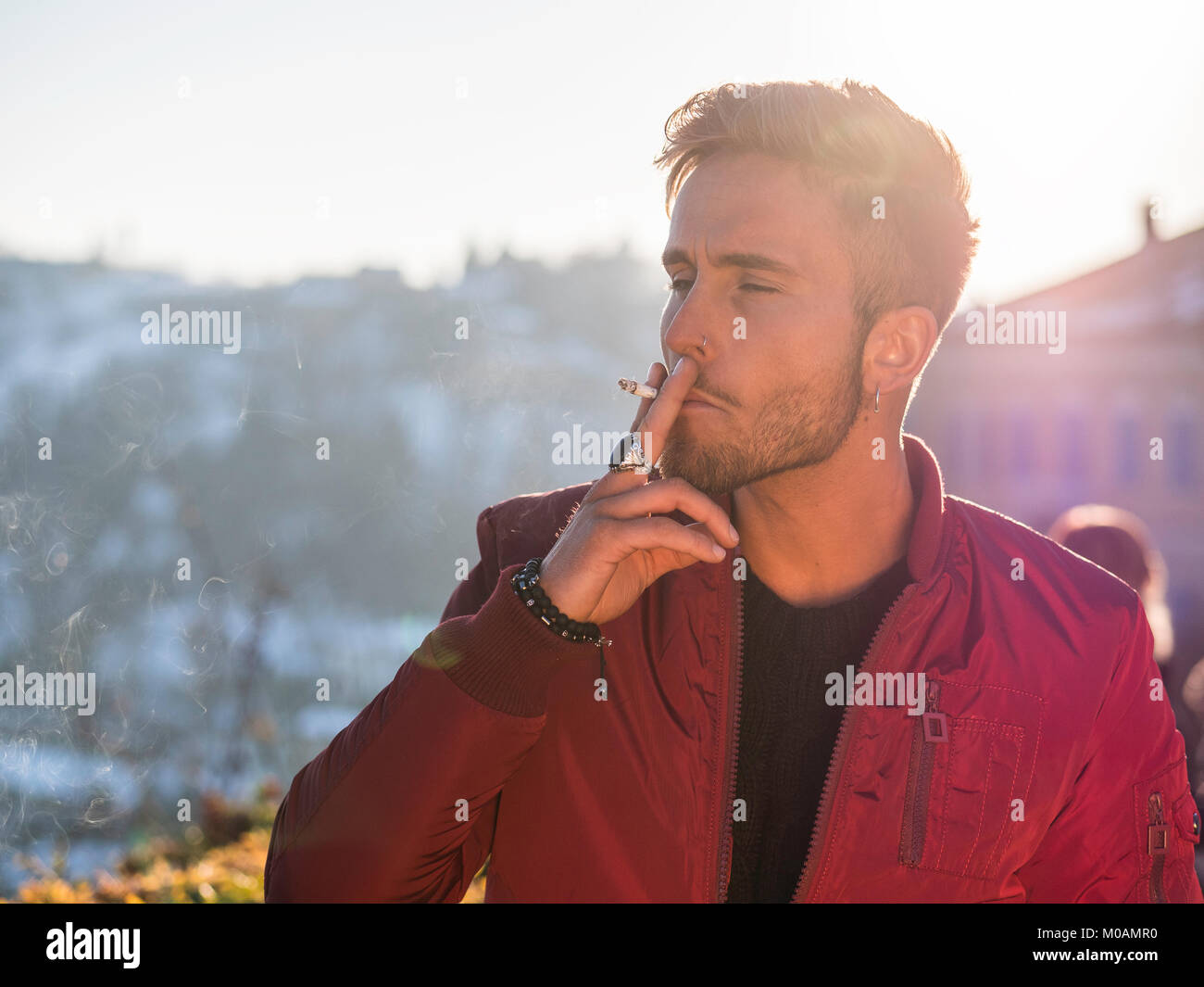 Blond smoking hi-res stock photography and images - Alamy
