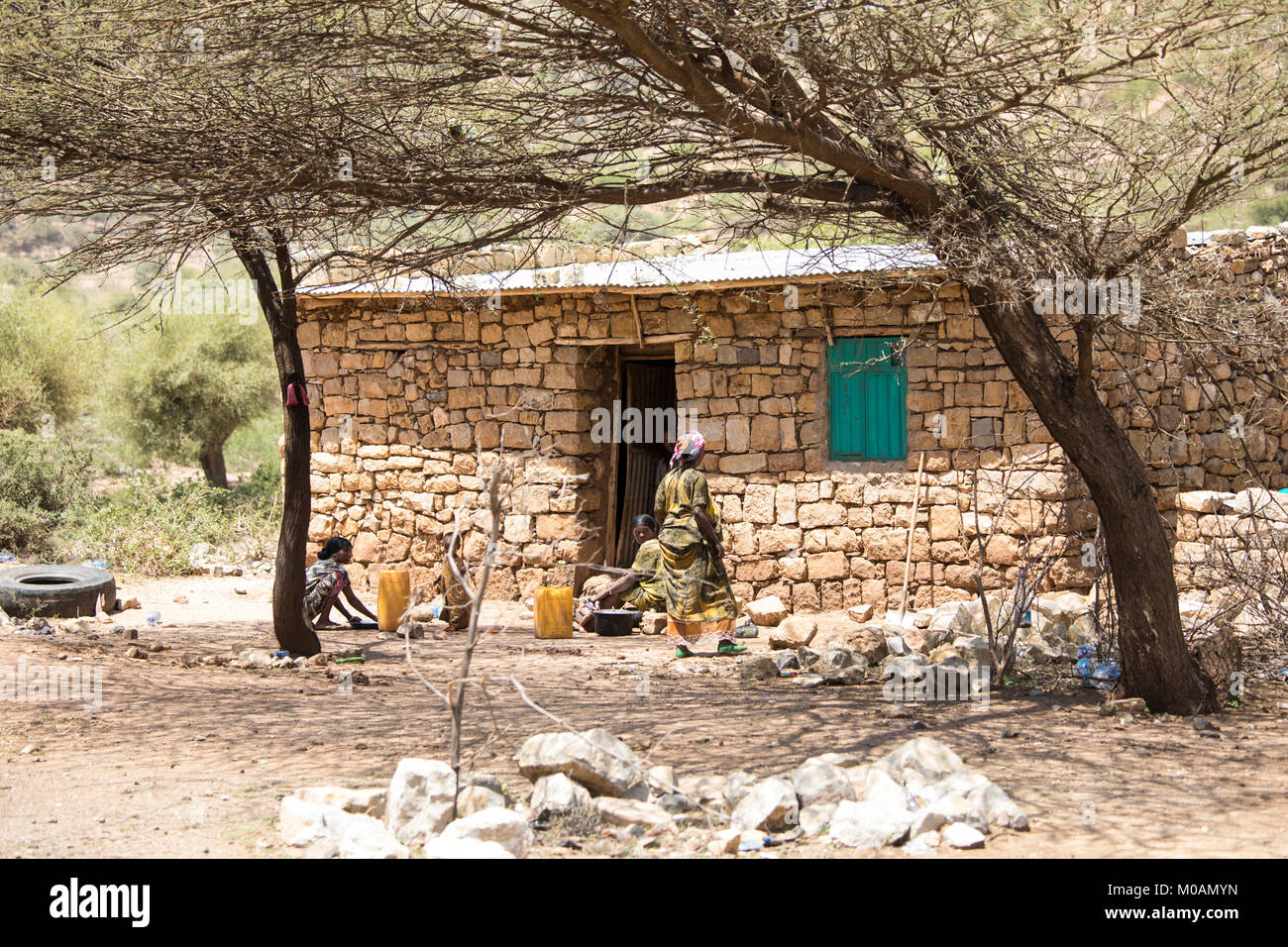 DIRE DAWA, ETHIOPIA-MARCH 31, 2017: Women prepare food outside a ...