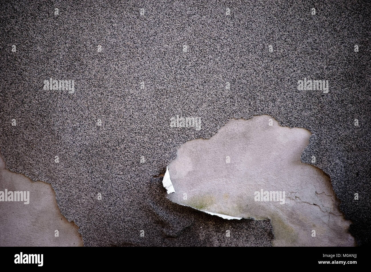 The close up of a facade with a chipped plaster layer Stock Photo - Alamy