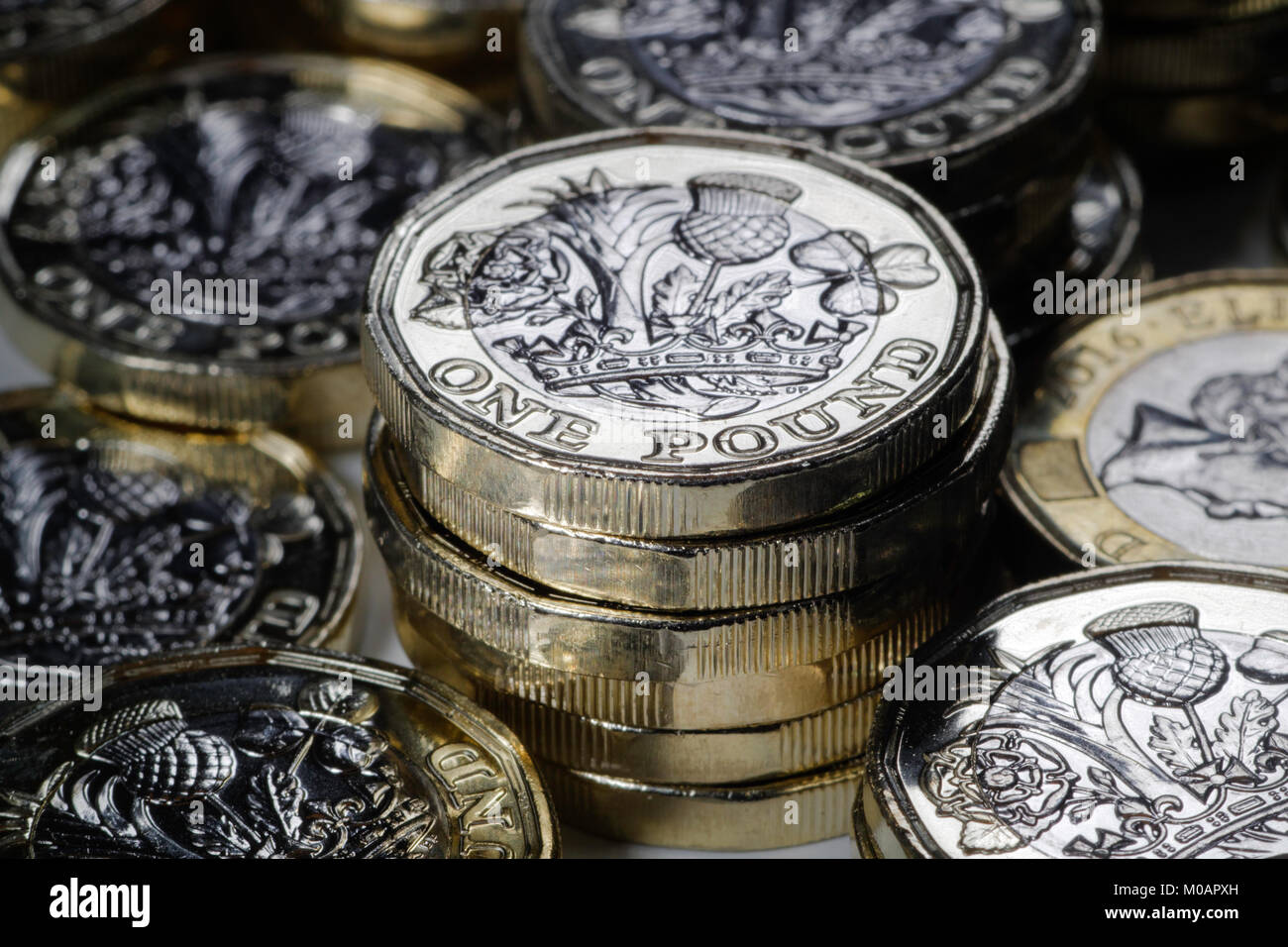 Piles pound coins hi-res stock photography and images - Alamy