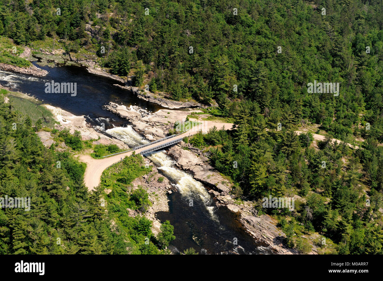 This is an aerial photograph of the bailey bridge linking the dokis ...