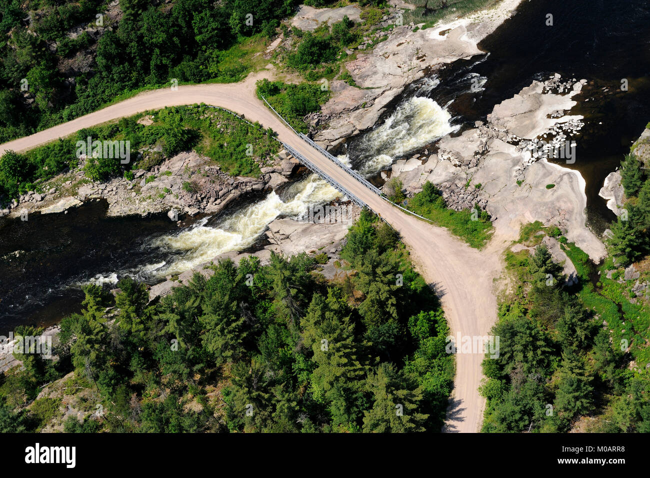 This is an aerial photograph of the bailey bridge linking the dokis ...