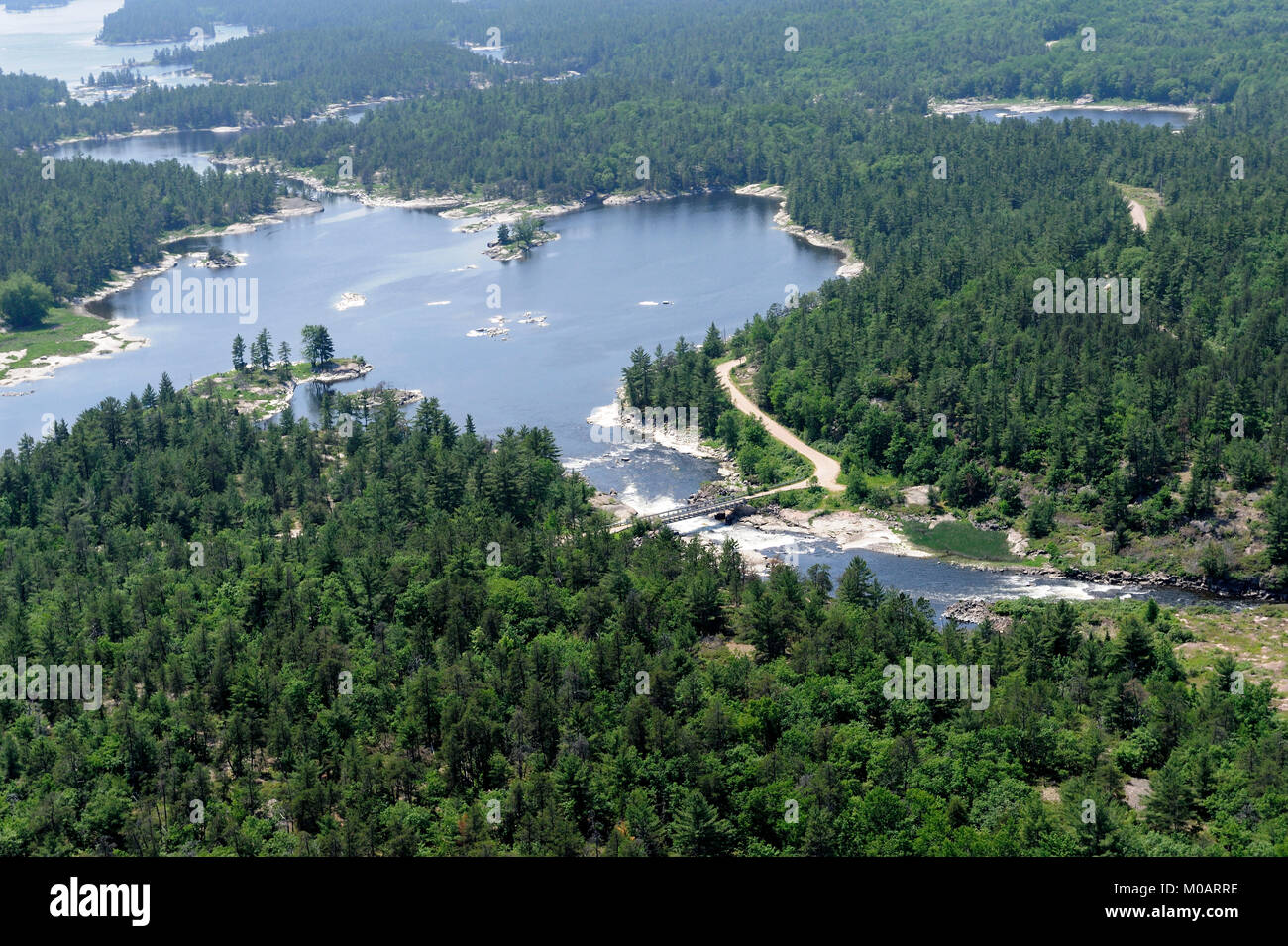 This is an aerial photograph of the bailey bridge linking the dokis ...