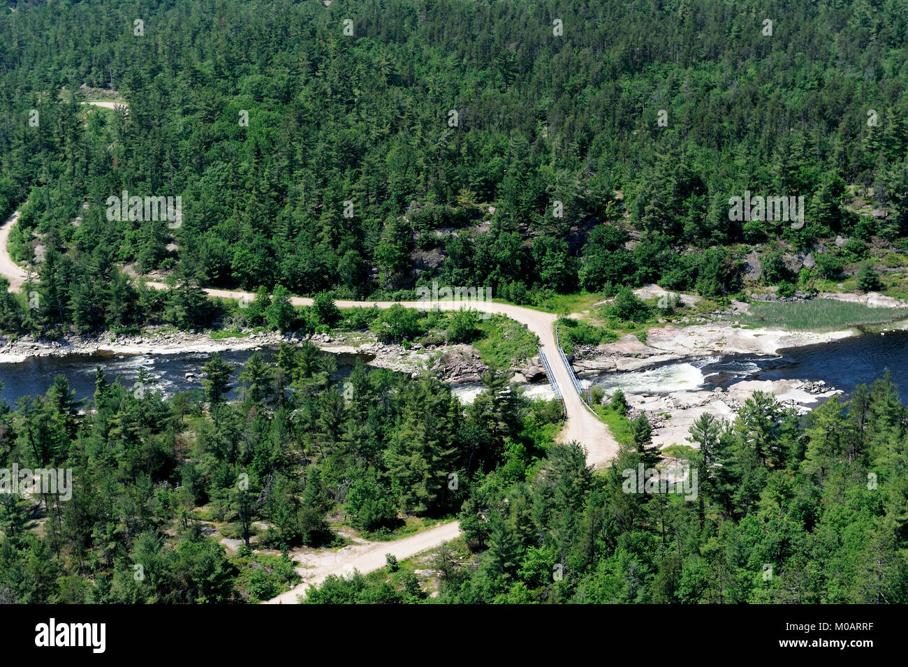 This is an aerial photograph of the bailey bridge linking the dokis ...