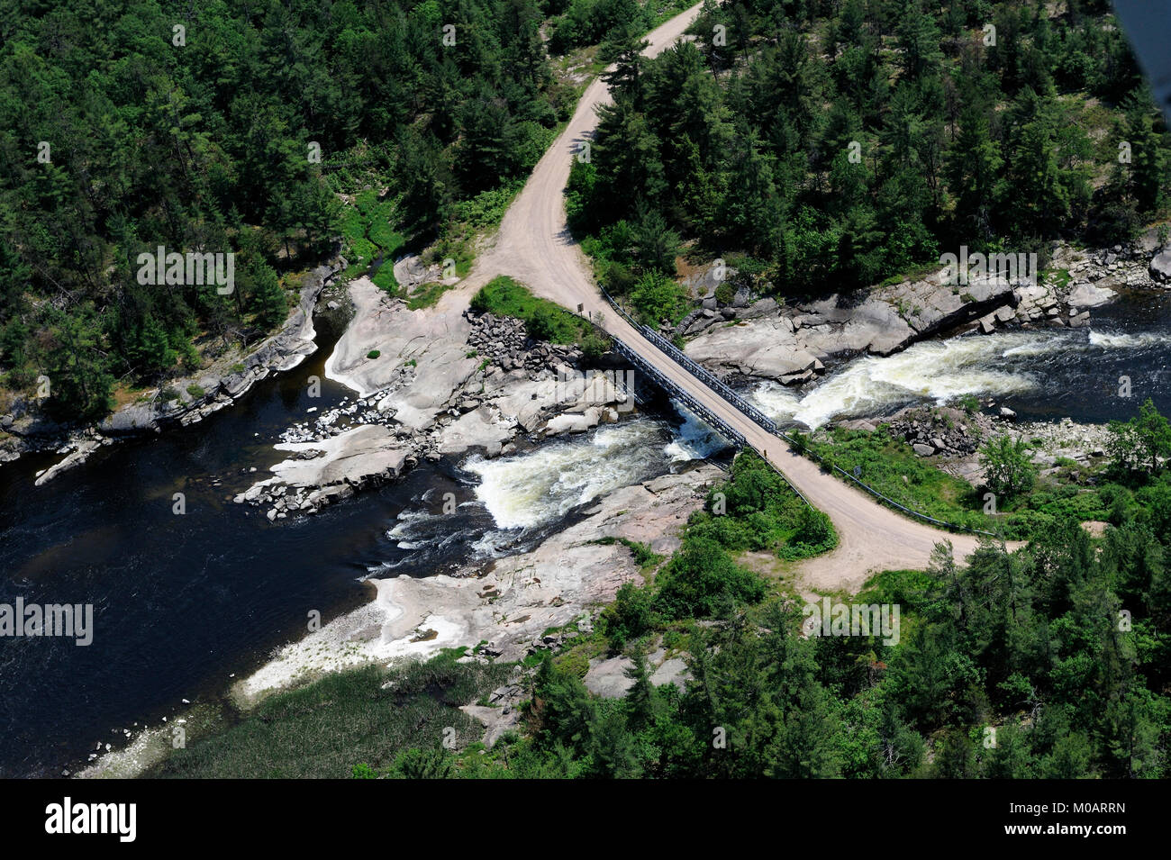 This is an aerial photograph of the bailey bridge linking the dokis ...