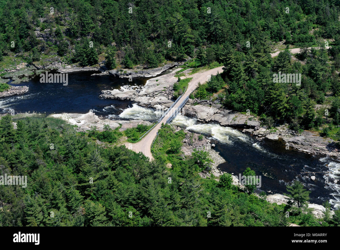 This is an aerial photograph of the bailey bridge linking the dokis ...