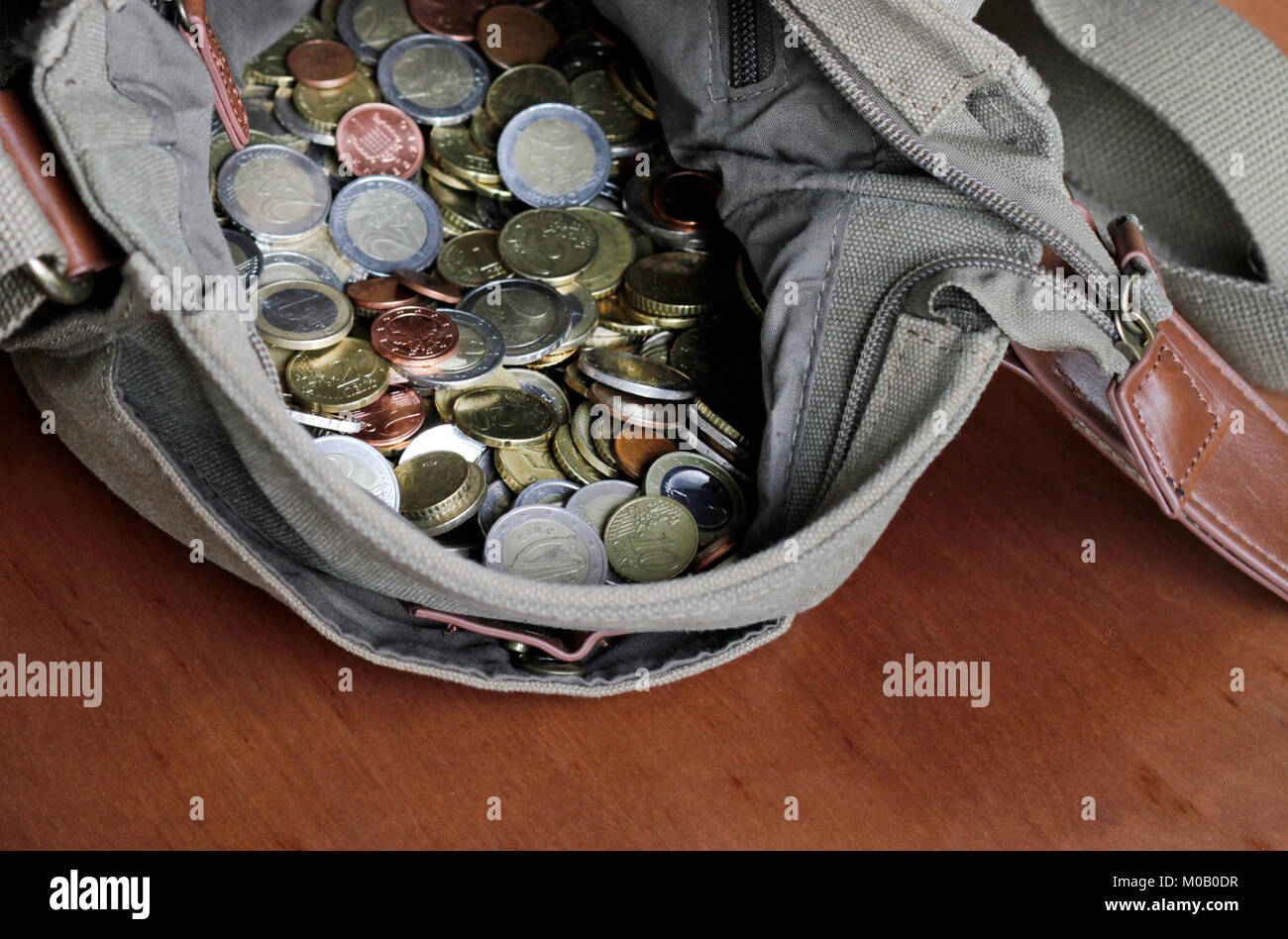 Bag full of cash hi-res stock photography and images - Alamy
